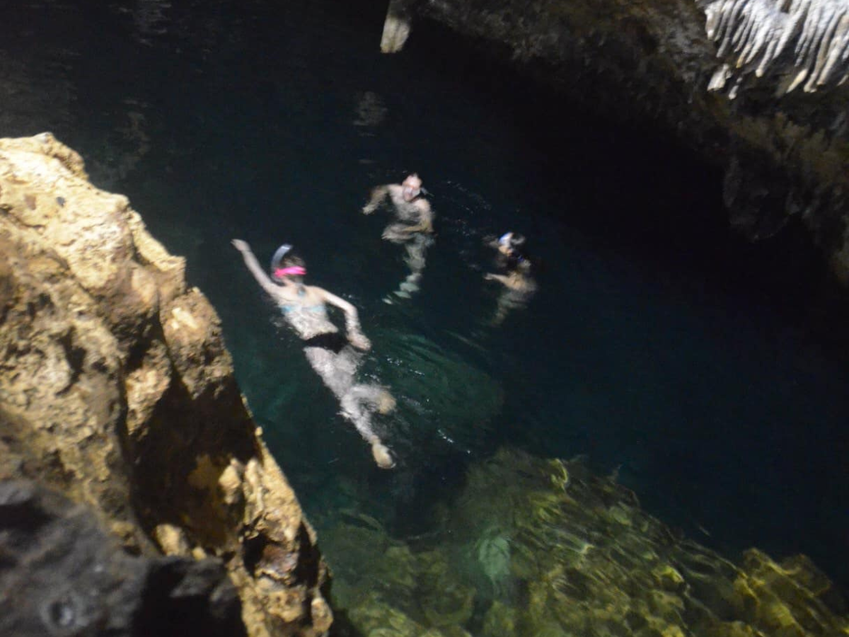 Deep Dive Exploration at Anahulu Cave Pool – Tonga Travel Troupe